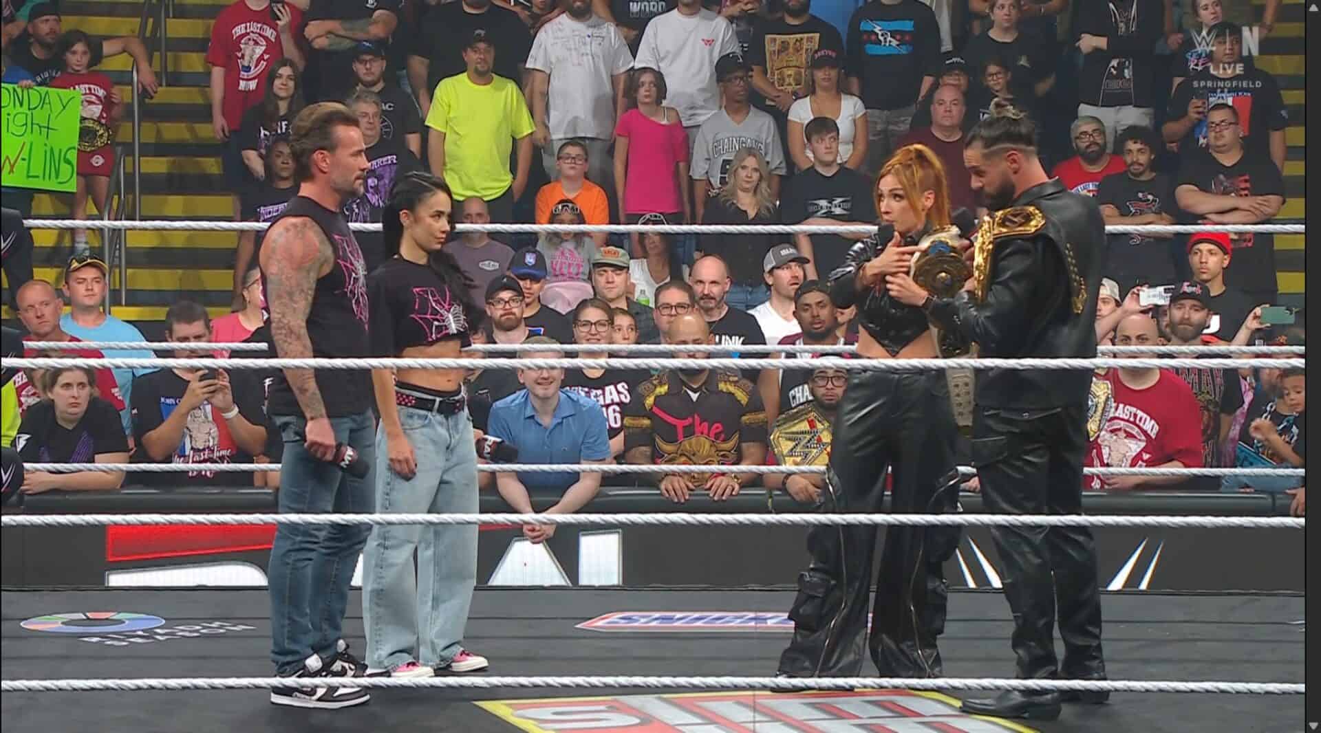 WWE Raw: AJ Lee Slaps Seth Rollins, Gets Hit With Manhandle Slam By ...